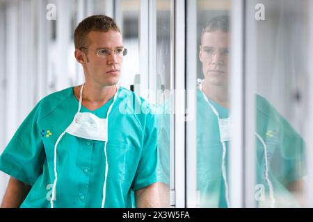 Young man doctor in medical concept Stock Photo - Alamy