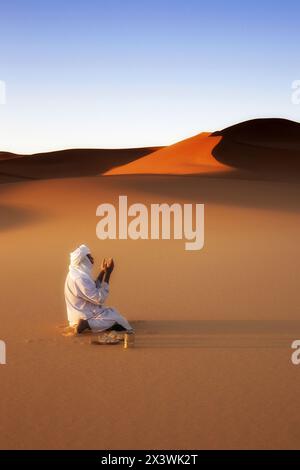 A Tuareg in the Ubari desert (Ubari Erg). The area is marked by some ...