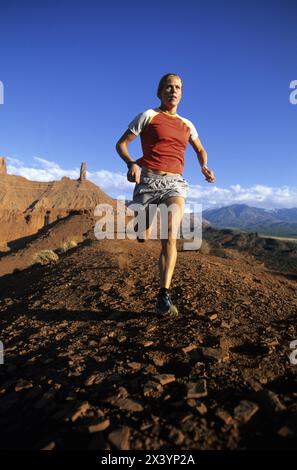 Female runner in Moab, Utah Stock Photo - Alamy