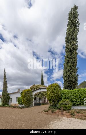 A scenic countryside landscape with lots of houses in hilly terrain ...