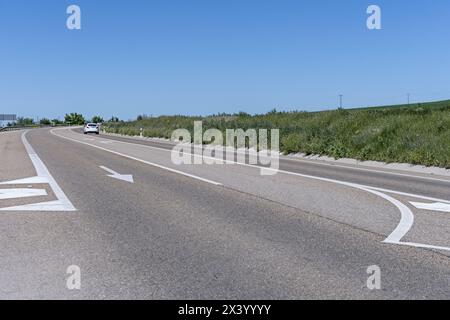 Indicator markings painted on a county road that a tractor-trailer ...
