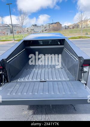 Back View of a Tesla Cybertruck in an Empty Suburban Parking Lot Stock ...