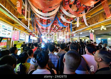 Lanzhou, China's Gansu Province. 26th Apr, 2024. Tourists take photos ...