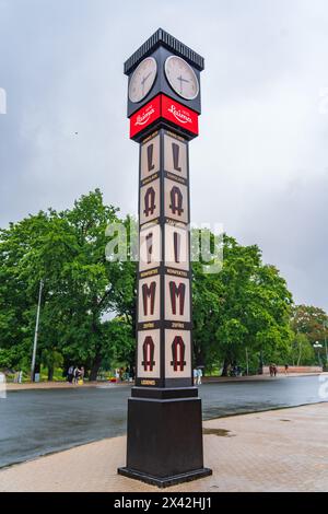 The Laima Clock in Riga, Latvia. The Freedom Monument is seen in the ...