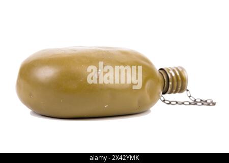An old olive army flask. Highlighted on a white background with a ...