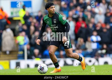 27, Milan van Ewijk of Coventry City passes the ball back during the ...