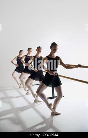 Dynamic ballet sequence. Elegant teen girls, ballet dancers standing at ...
