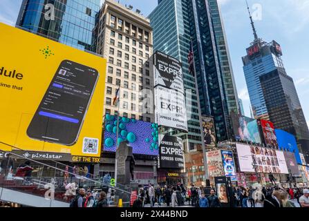 Times Square buildings are covered with bright electronic billboards 24 ...