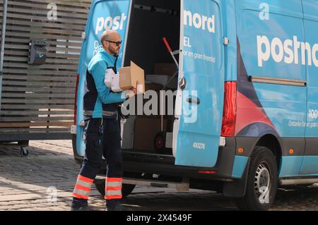 Copenhagen, Denmark /30 April 2024/.Postnord parcels and packets ...