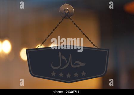 Halal text sign arab in windows facade shop food boutique Stock Photo ...