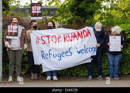Leeds, UK. 30 APR, 2024. Group holds "Refugees welcome" and "Stop the ...