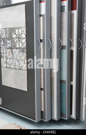 Many different samples of tiles on display in store Stock Photo - Alamy