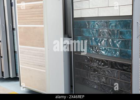 Many different samples of tiles on display in store Stock Photo - Alamy