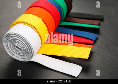 Colorful karate belts on gray textured background, top view Stock Photo ...