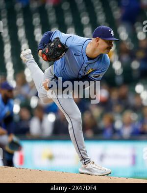 Milwaukee Brewers pitcher Tyler Alexander, foreground, walks toward the ...