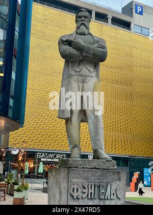 a statue of former manchester resident friedrich engels in tony wilson ...