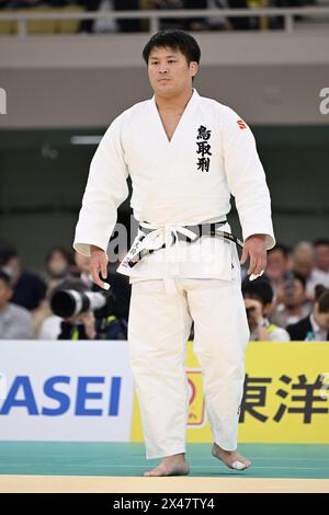 Tokyo, Japan. 29th Apr, 2024. Men wearing festival jackets stand by ...