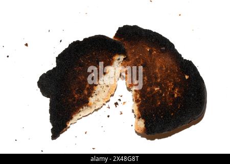 A Very Burnt Bread Roll Torn or Cut in Half Toast Close Up Texture ...