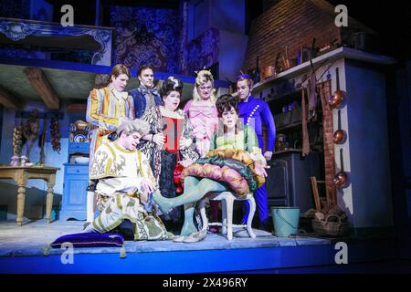 trying the slipper - l-r: (kneeling) Daniel Robinson (Herald), Oliver ...