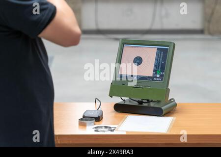 Shooting range with targets and equipment indicating hits Stock Photo ...