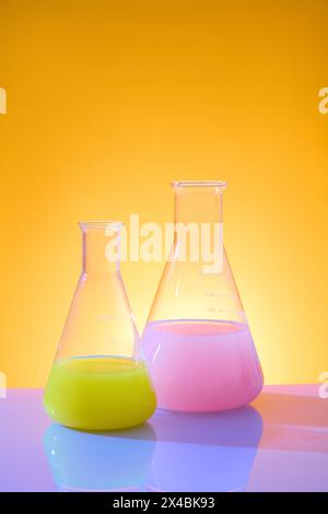 Front view of laboratory equipments: erlenmeyer flasks, beaker and ...