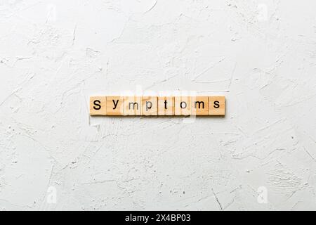 Symptoms of stress symbol. Concept words Symptoms of stress on wooden ...