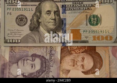 In this photo, you can see a 5000 Iranian Rial note, a 100 US Dollar ...