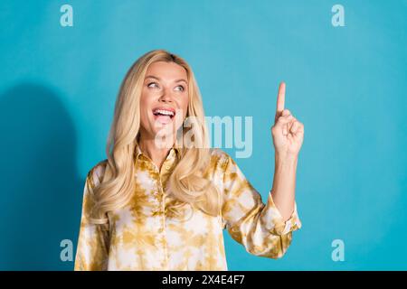 surprised secretary showing wow gesture while looking at computer ...