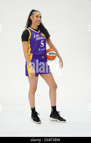 Los Angeles Sparks forward Dearica Hamby, left, poses beside daughter ...