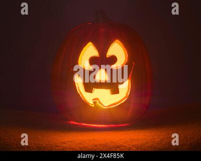 USA, Washington State. Smiling Jack O Lantern face on Pumpkin at ...