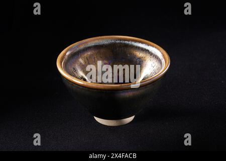 Beautiful Chinese Fujian Jianzhan tea cup on black background Stock ...