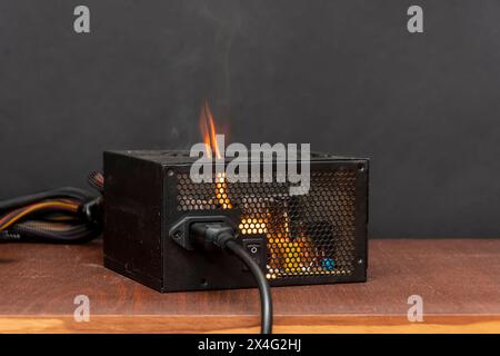 Ignition of the computer power supply, short circuit, close-up ...