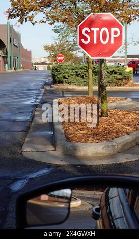 multiple stop signs- common to parking areas of local stores Stock ...