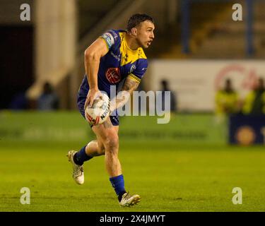 Sam Powell of Warrington Wolves passes the ball during the Betfred ...