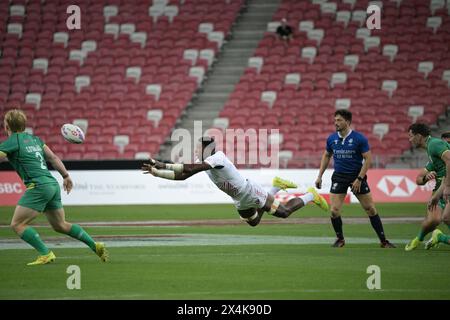 Singapore. 3rd May, 2024. United States' player Kevon Williams scores a ...