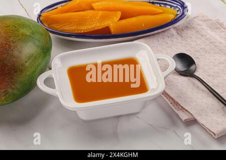 Sweet delicous mango puree in the bowl Stock Photo - Alamy