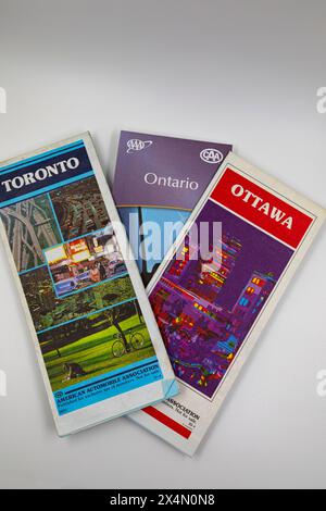 Canadian fold out paper travel maps Stock Photo - Alamy
