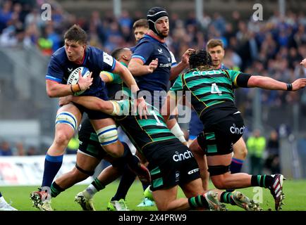 Leinster Rugby's Joe McCarthy is tackled by La Rochelle players during ...