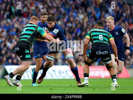Leinster Rugby's Joe McCarthy is tackled by La Rochelle players during ...
