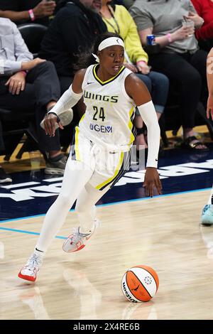 Indiana Fever guard Caitlin Clark (22) shoots as Dallas Wings' Jacy ...