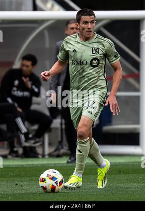 LAFC defender Sergi Palencia (14) shields LA Galaxy forward Joseph ...