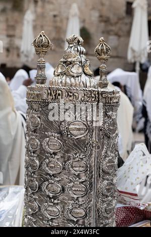 A decorative, Sephardic style Torah in a copper case designed with a ...