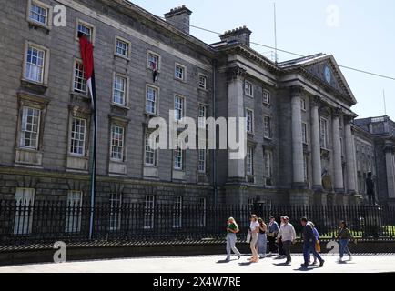 Palestine flags hang from windows of Trinity College in Dublin. The ...