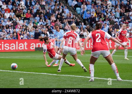 Manchester City's Mary Fowler (second right) celebrates with team-mates ...