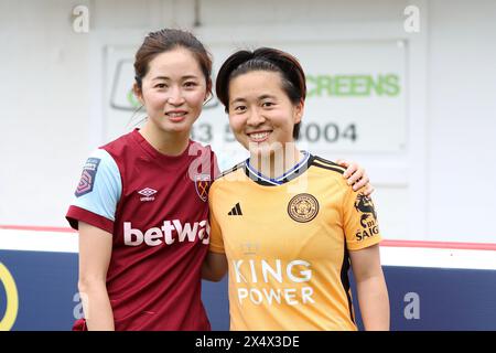 L-R Risa Shimizu! of West Ham United WFC and Kerys Harrop of Tottenham ...