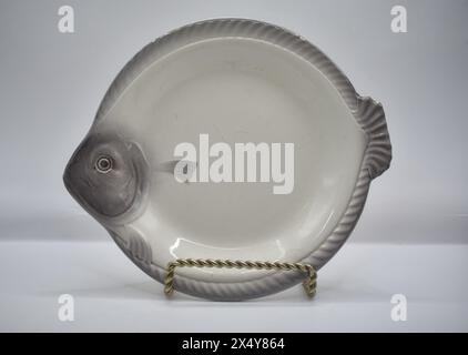 antique porcelain plates shaped like fish Stock Photo - Alamy