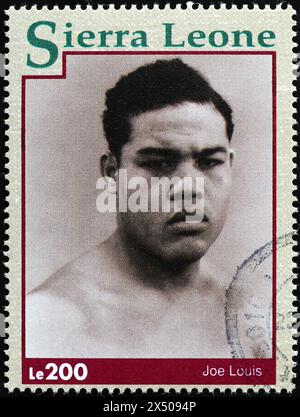 Boxer Joe Louis on american postage stamp Stock Photo - Alamy