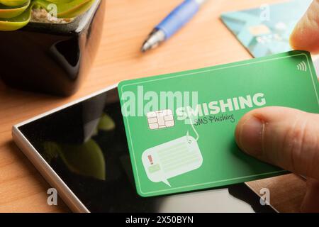 Smishing (SMS message phishing) concept: credit card inside a ...