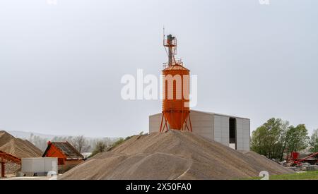 Concrete production plant. Piles of crushed stone and sand Stock Photo ...