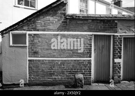 TRURO CITY CORNWALL RED BRICK BUILDING WITH BLUE DOOR Stock Photo - Alamy